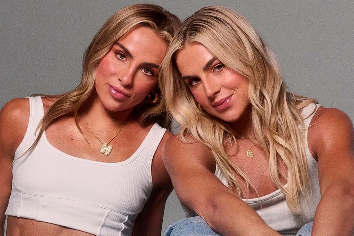 The Cavinder twins surprise with their 'Baywatch' look: Red swimsuits ...