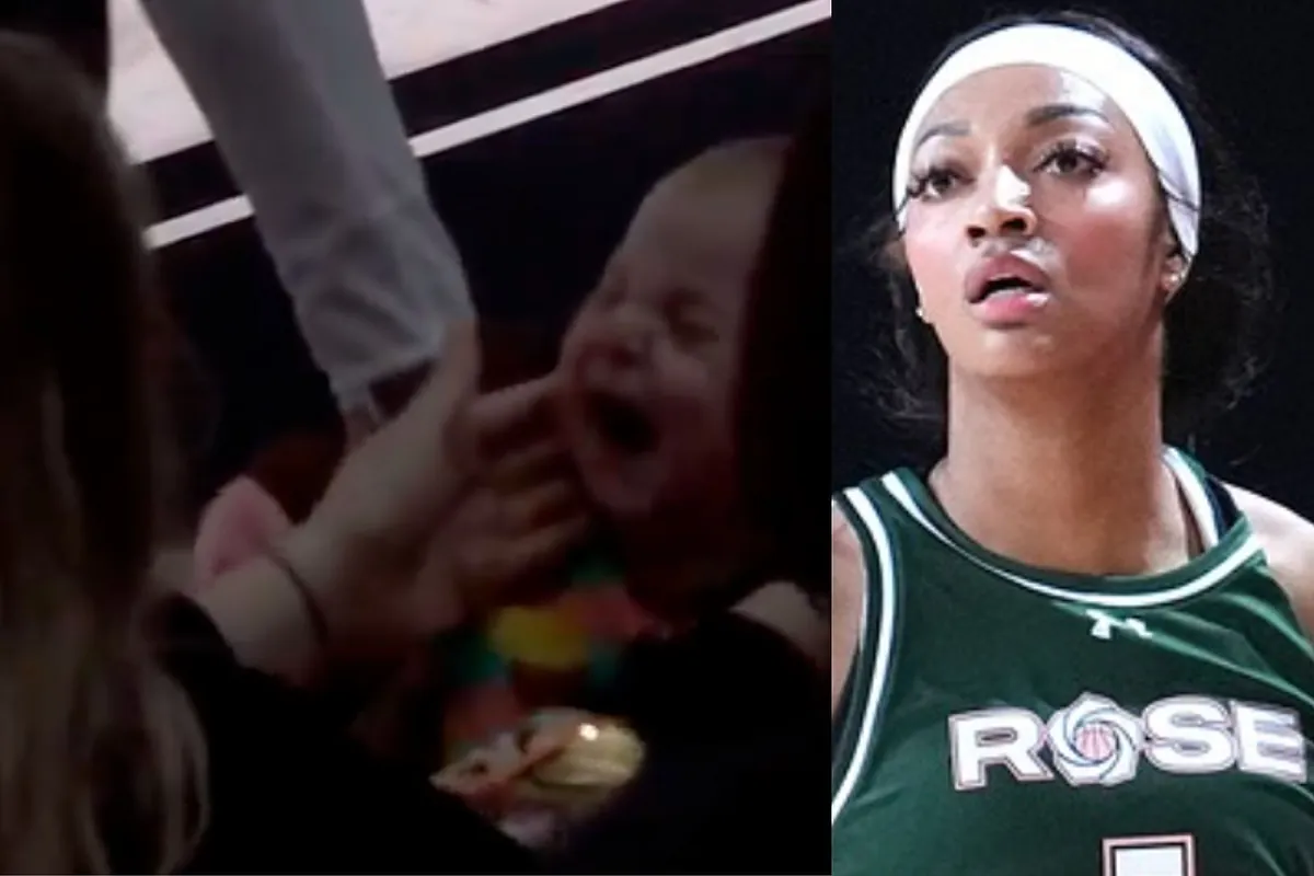Baby gets hit in the head by a basketball during an Angel Reese's team ...